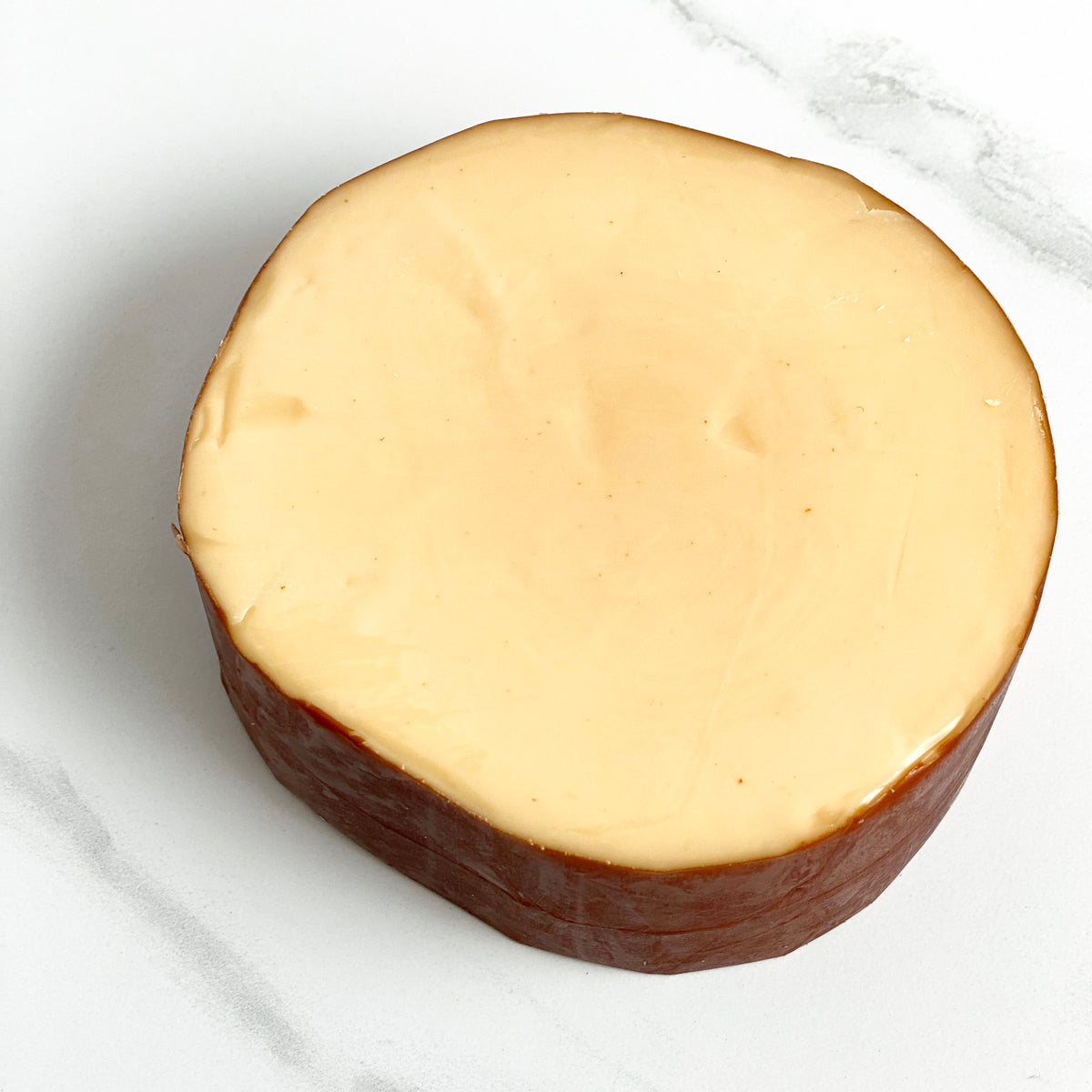 Smoked Gouda Cheese-Shipped and Delivered by Cheesyplace.com in Canada